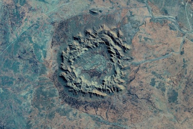 Gosses Bluff Impact Crater looking down aerial view from above, bird’s ...